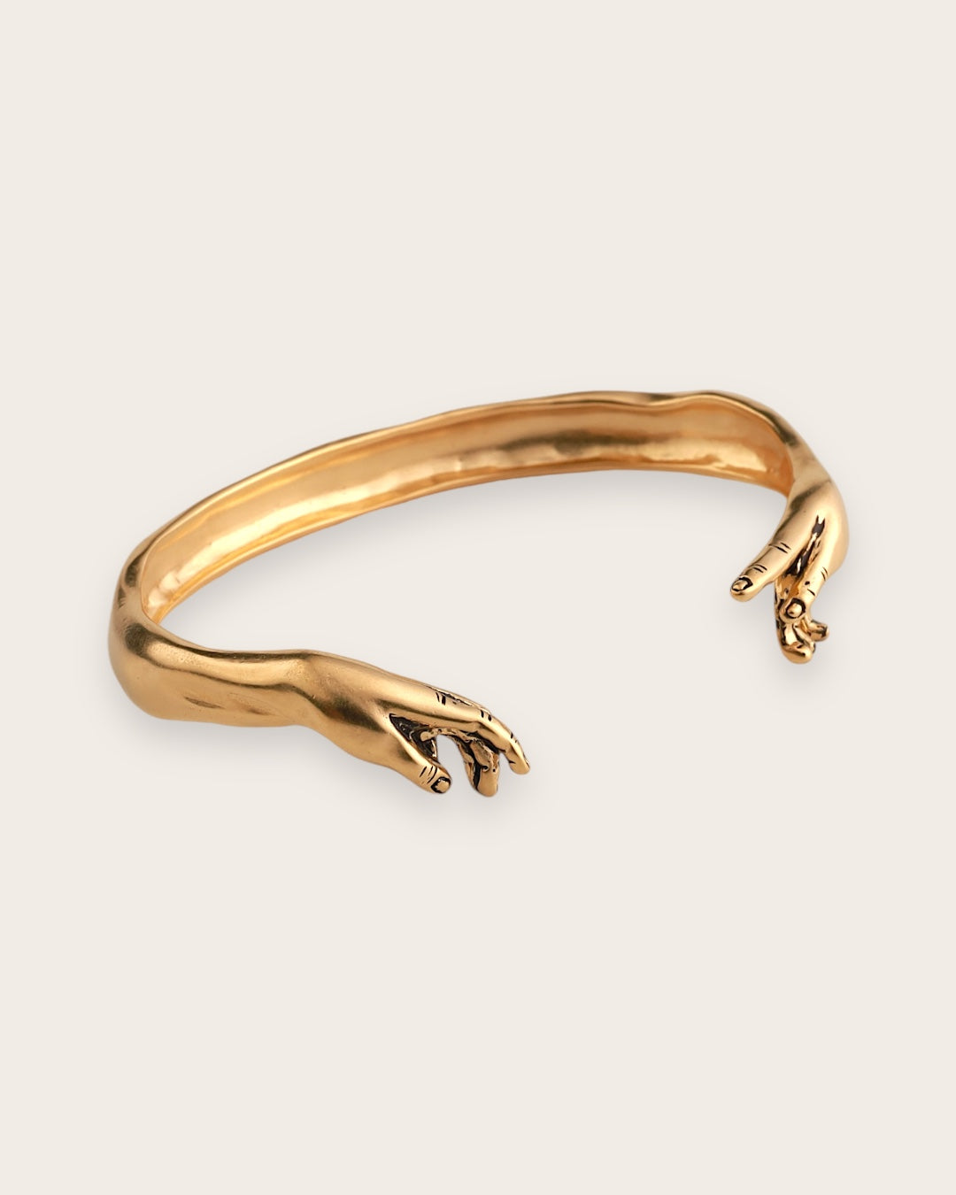 HAND OF GOD CUFF IN GOLD – Untold-truth-ecom
